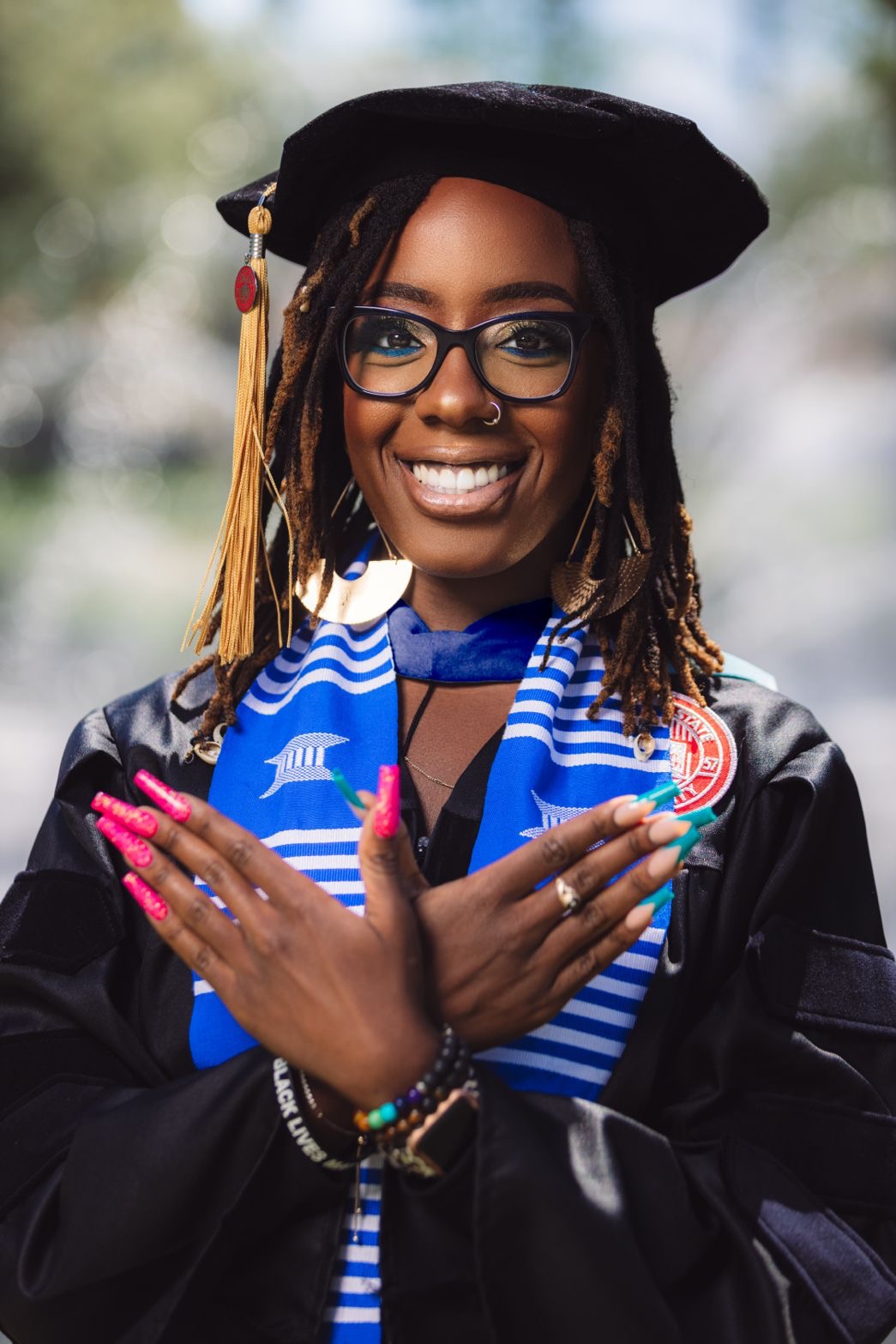 MEET DR. TRISTEN JOHNSON, THE FIRST OF HER FAMILY TO EARN A PhD ...